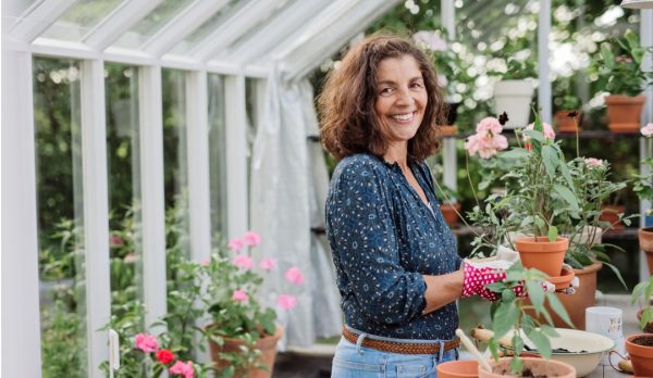 growing-planting-homegrown-food-in-her-greenhouse-picture-id657815460 ...
