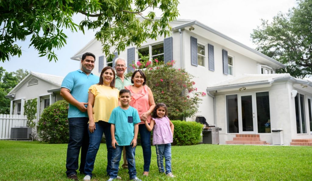 smiling-hispanic-family-outside-modern-twostory-miami-home-picture ...