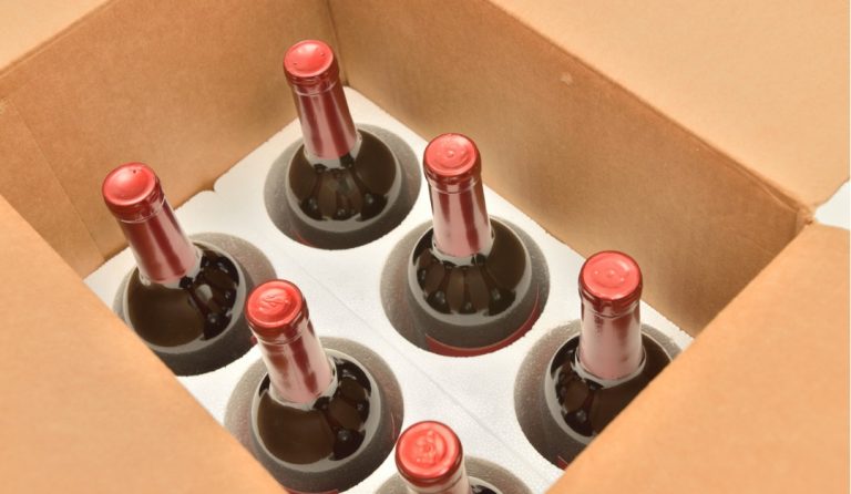 secure-shipping-of-wine-bottles-in-a-box-picture-id167199673 (1) — RISMedia