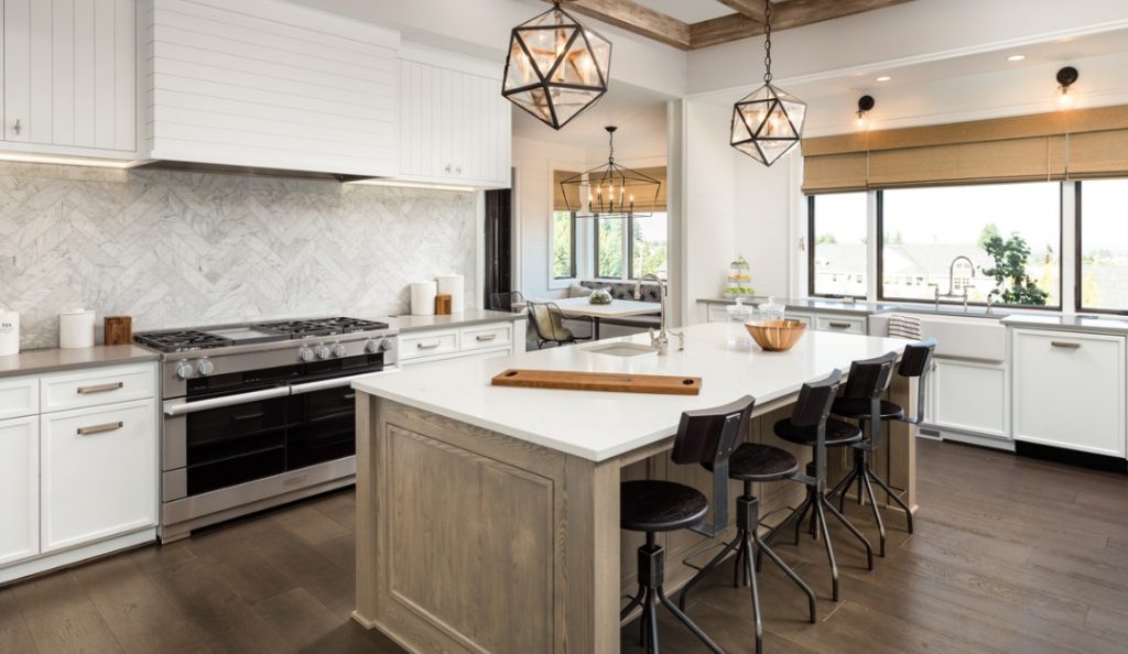 beautiful-kitchen-in-new-luxury-home-with-island-and-pendant-light ...