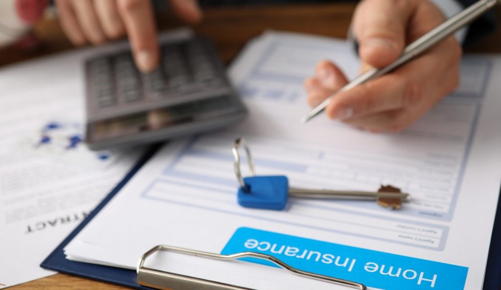 drawing-up-and-signing-home-insurance-contract-picture-id1314245683 ...