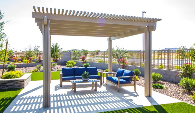 rear-yard-pergola-covering-patio-furniture-picture-id1286624155 — RISMedia