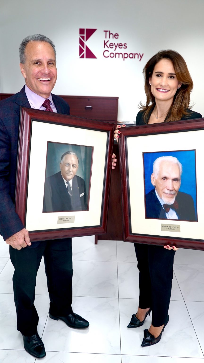 Mike and Christina with Photos — RISMedia